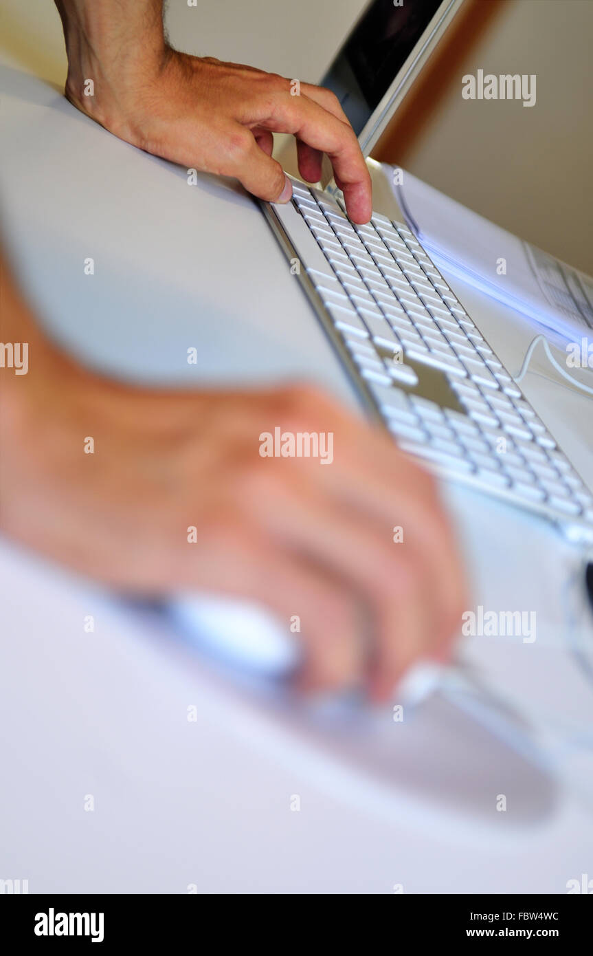 lose-up of male hand on mouse while working on laptop Stock Photo - Alamy