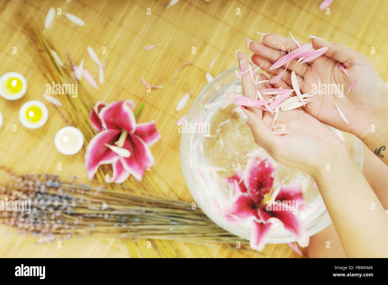 hand spa and beauty treatment with aroma and flowers in water Stock ...