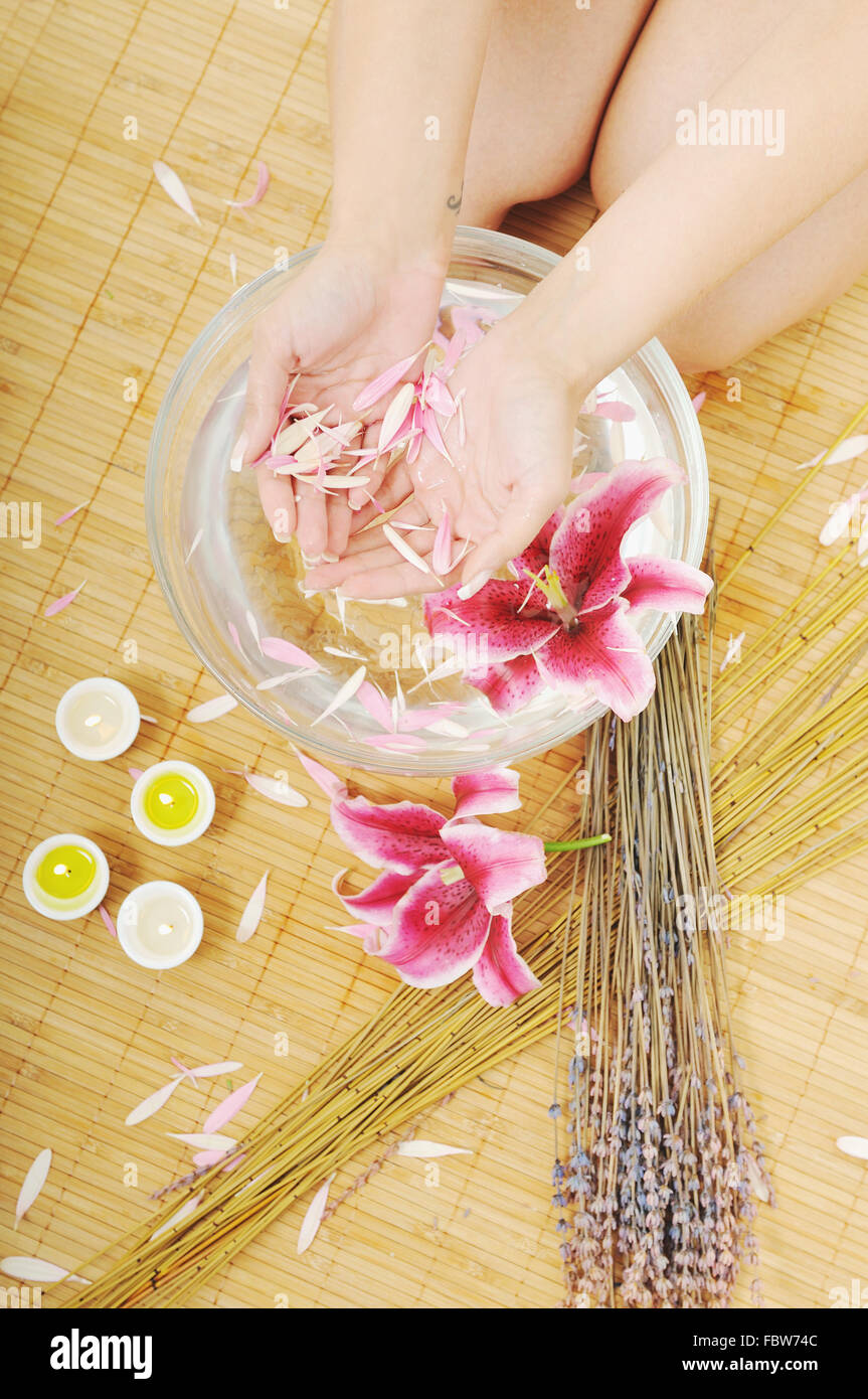 hand spa and beauty treatment with aroma and flowers in water Stock ...