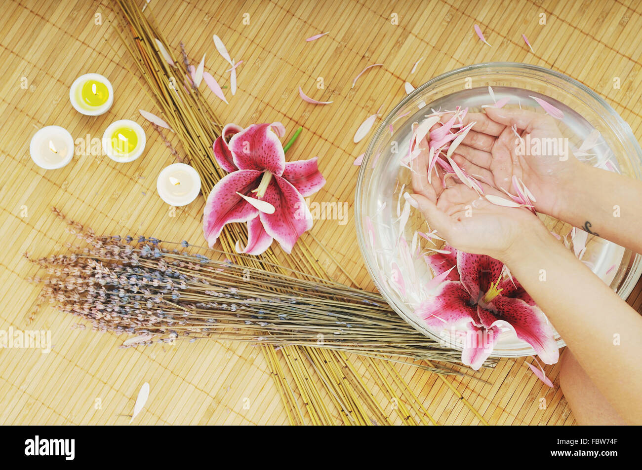 hand spa and beauty treatment with aroma and flowers in water Stock ...