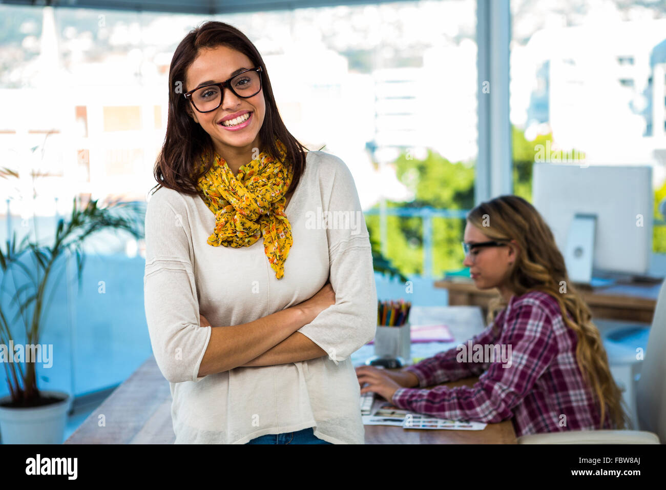 Two girls work at office Stock Photo - Alamy