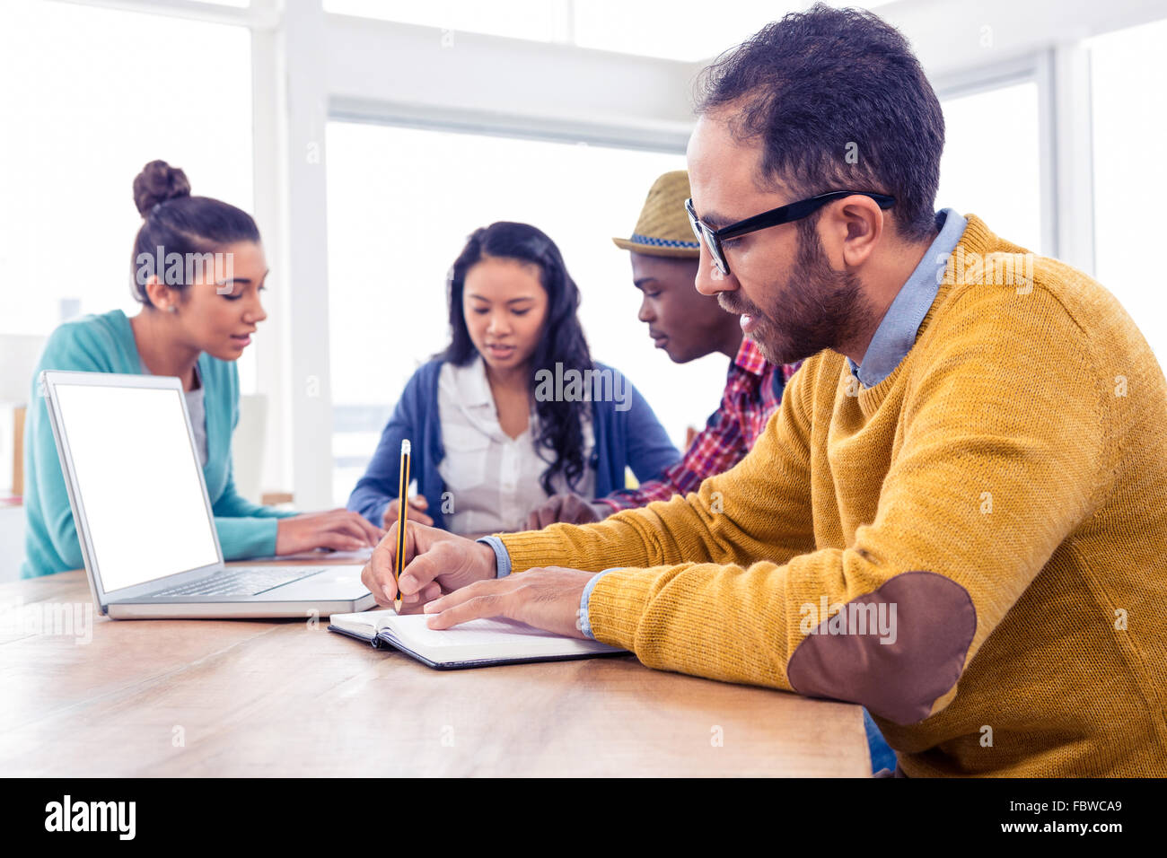 Man writing in book hi-res stock photography and images - Alamy