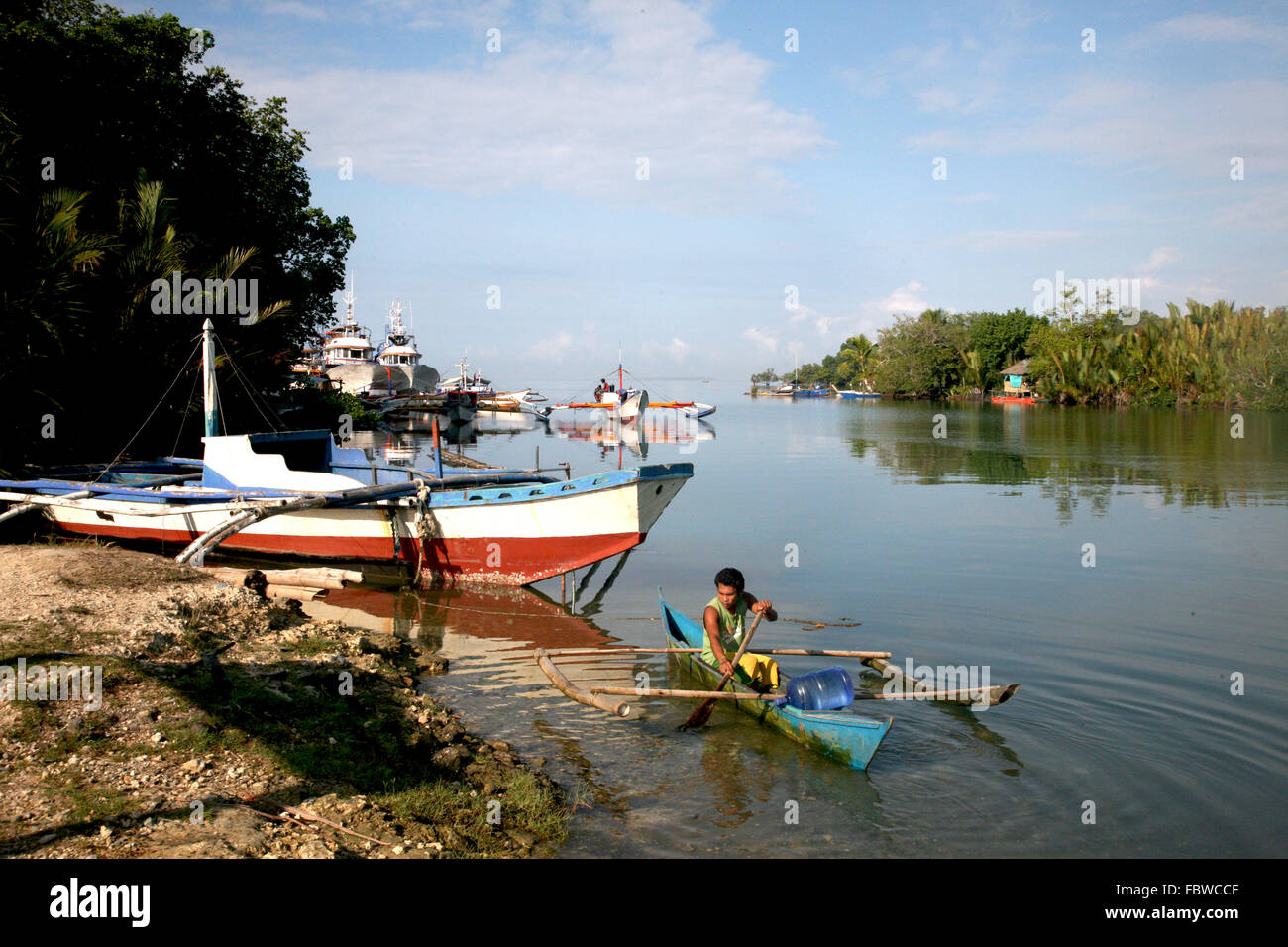 Philippines Bohol Fishing boats on the river at Loay Adrian Baker Stock ...