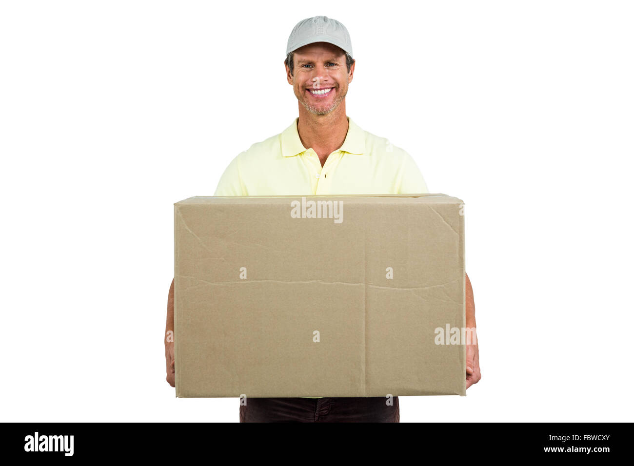 Portrait of cheerful delivery man with box Stock Photo - Alamy