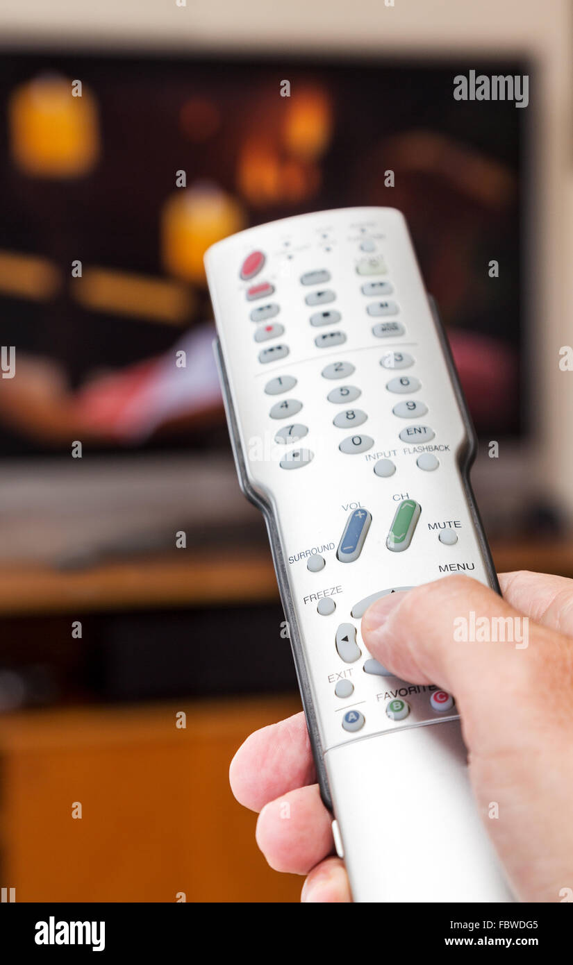 Close up of TV remote control with television Stock Photo - Alamy