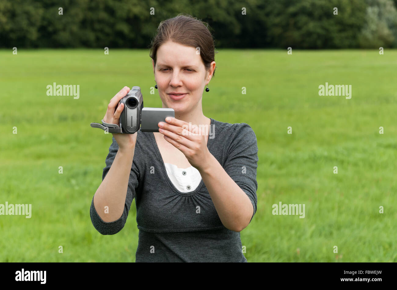 Zoom video camcorder woman hi-res stock photography and images - Alamy