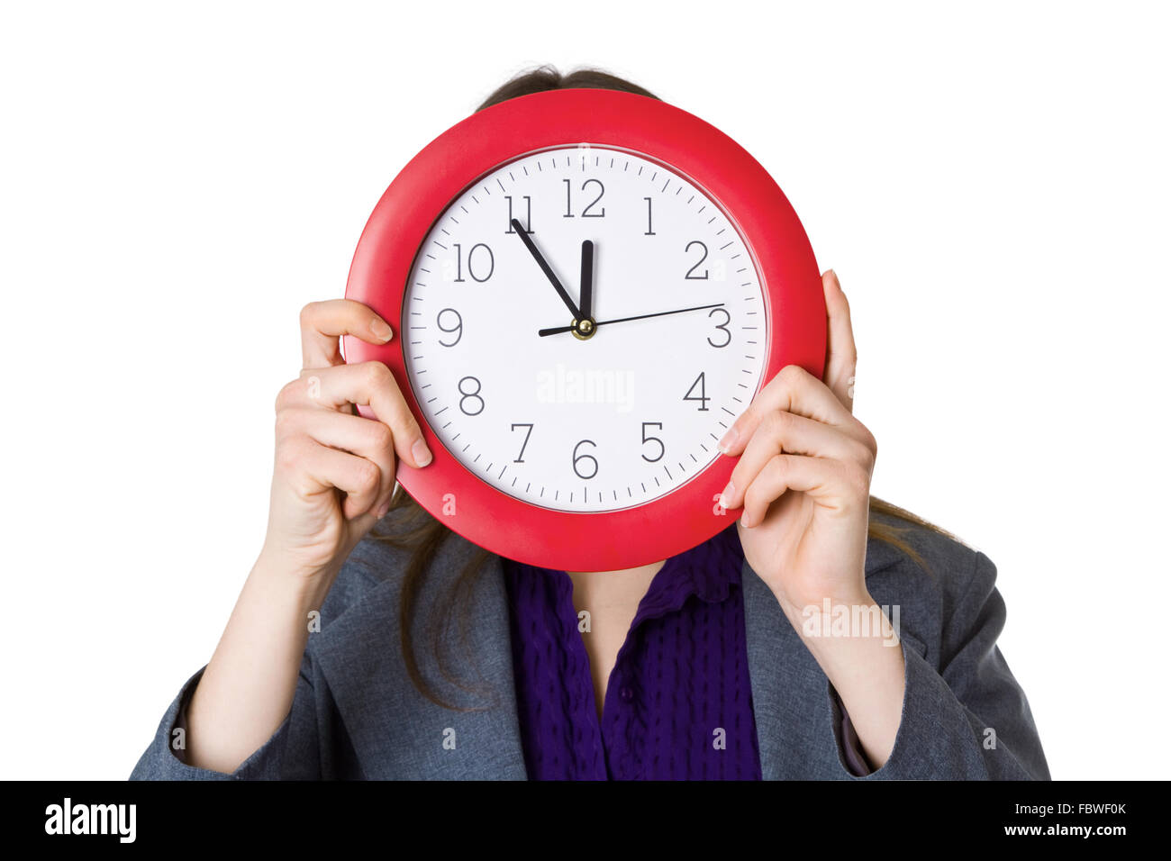 Woman with clock Stock Photo - Alamy