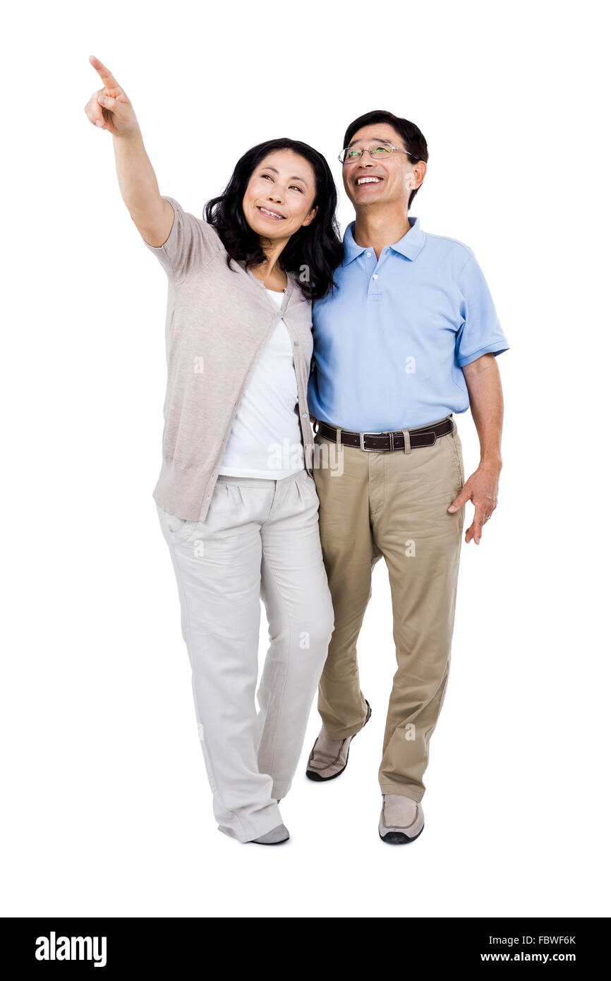 Smiling couple holding each other Stock Photo - Alamy