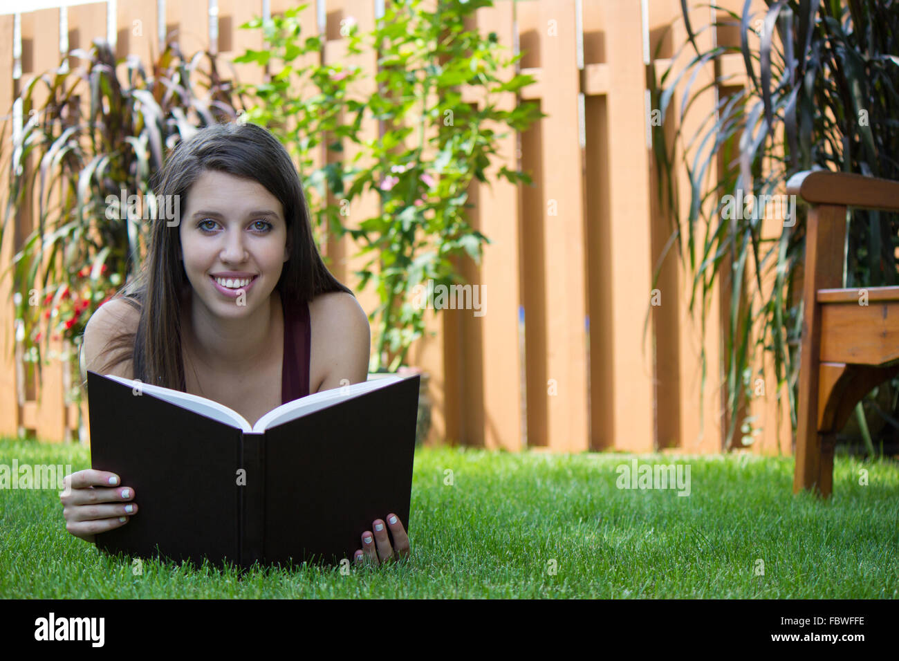 Reading Outside - Copyspace Stock Photo - Alamy