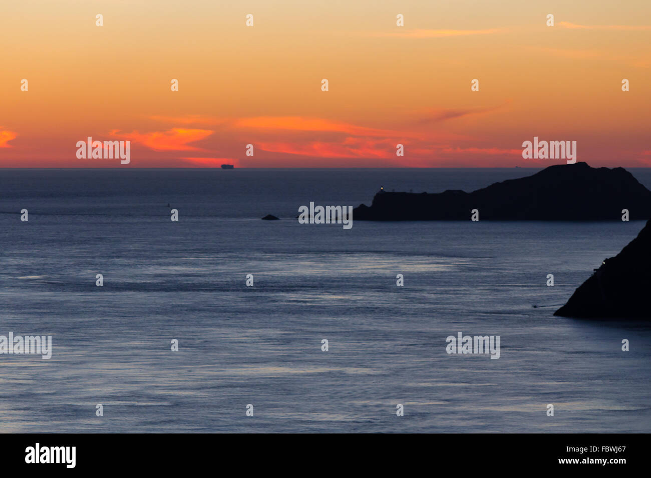 Tranquil sunset over ocean hi-res stock photography and images - Alamy