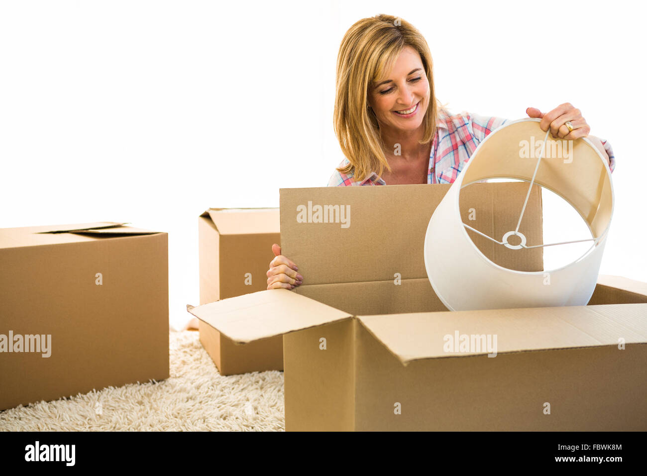 Female hands opening boxes hi-res stock photography and images - Alamy