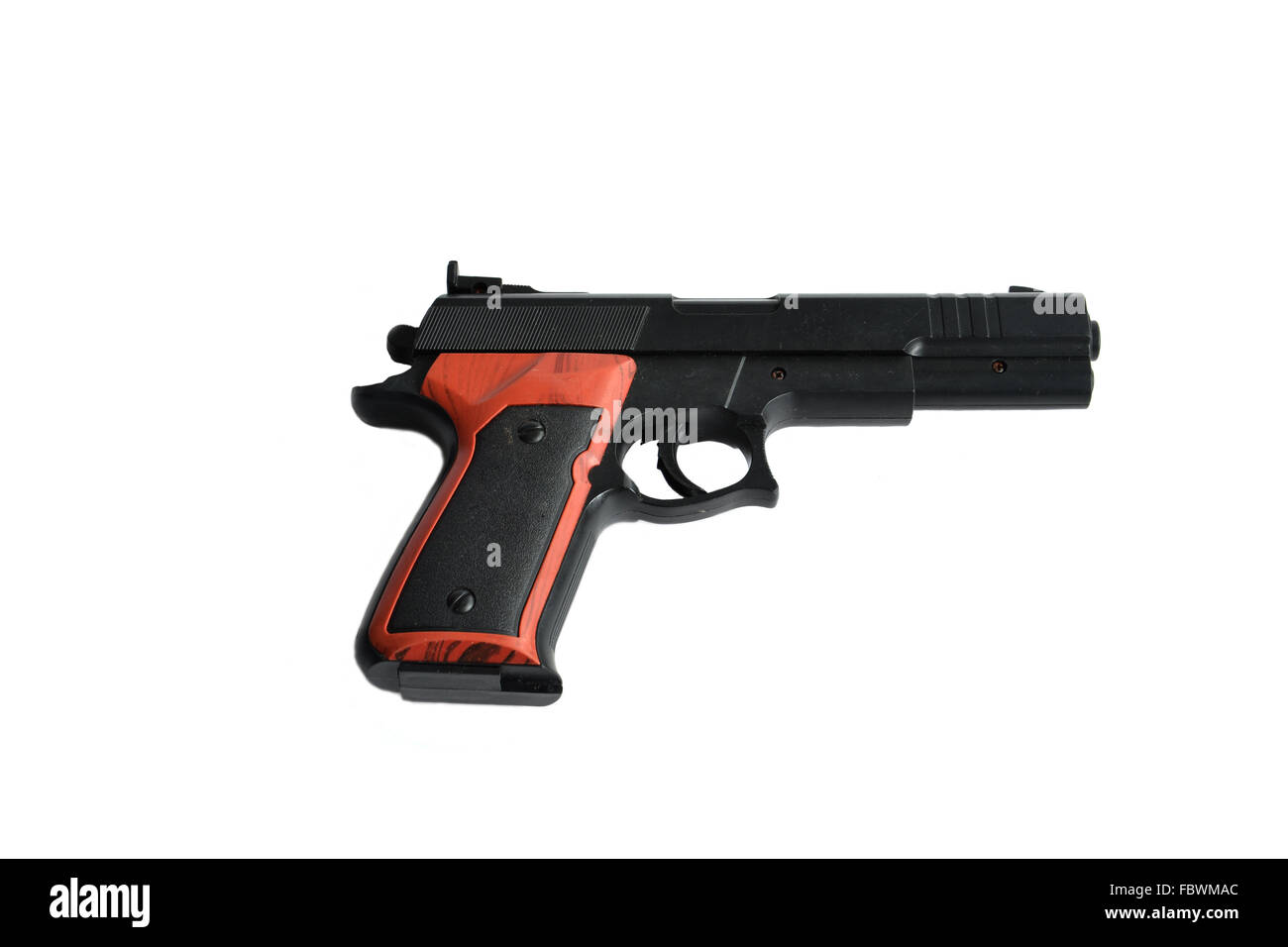 A toy gun on a white background Stock Photo - Alamy