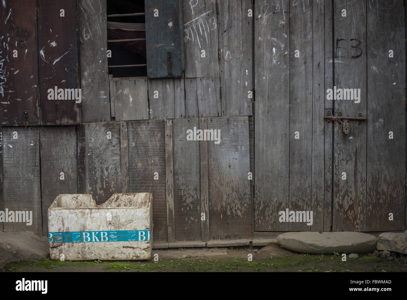 Interesting and derelict boarded up shop front at a border crossing in ...