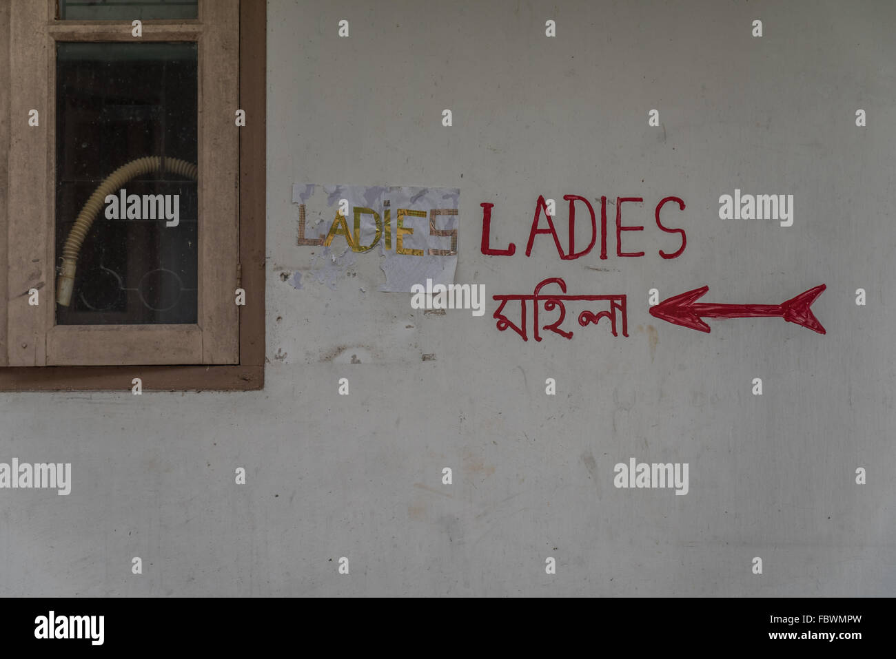 Ladies toilet sign arrow hi-res stock photography and images - Alamy