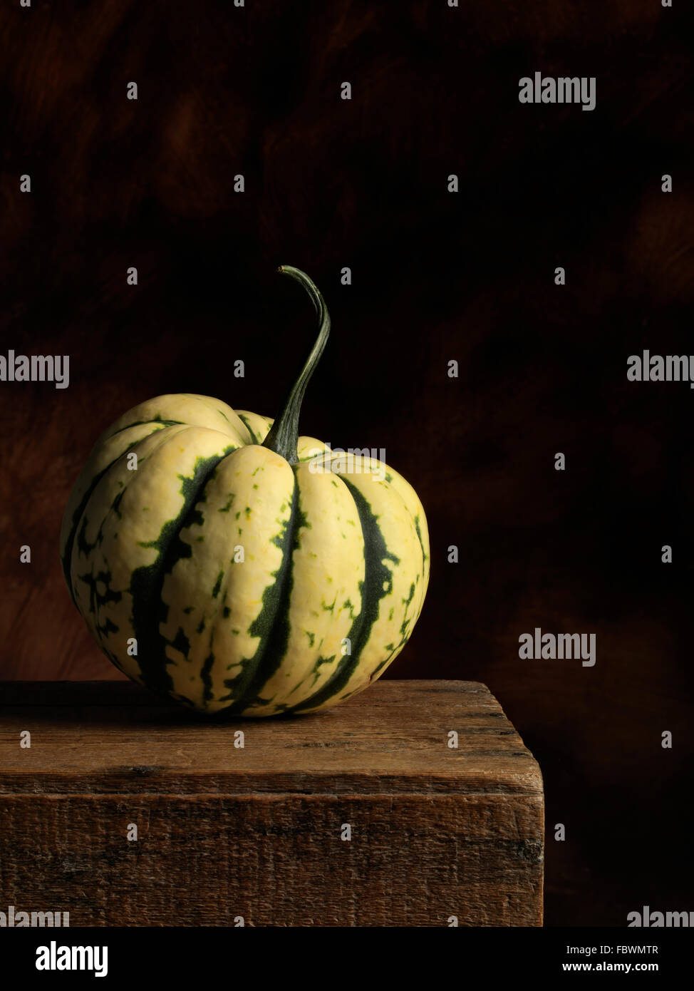 A squash vegetable on a old wooden box Stock Photo - Alamy