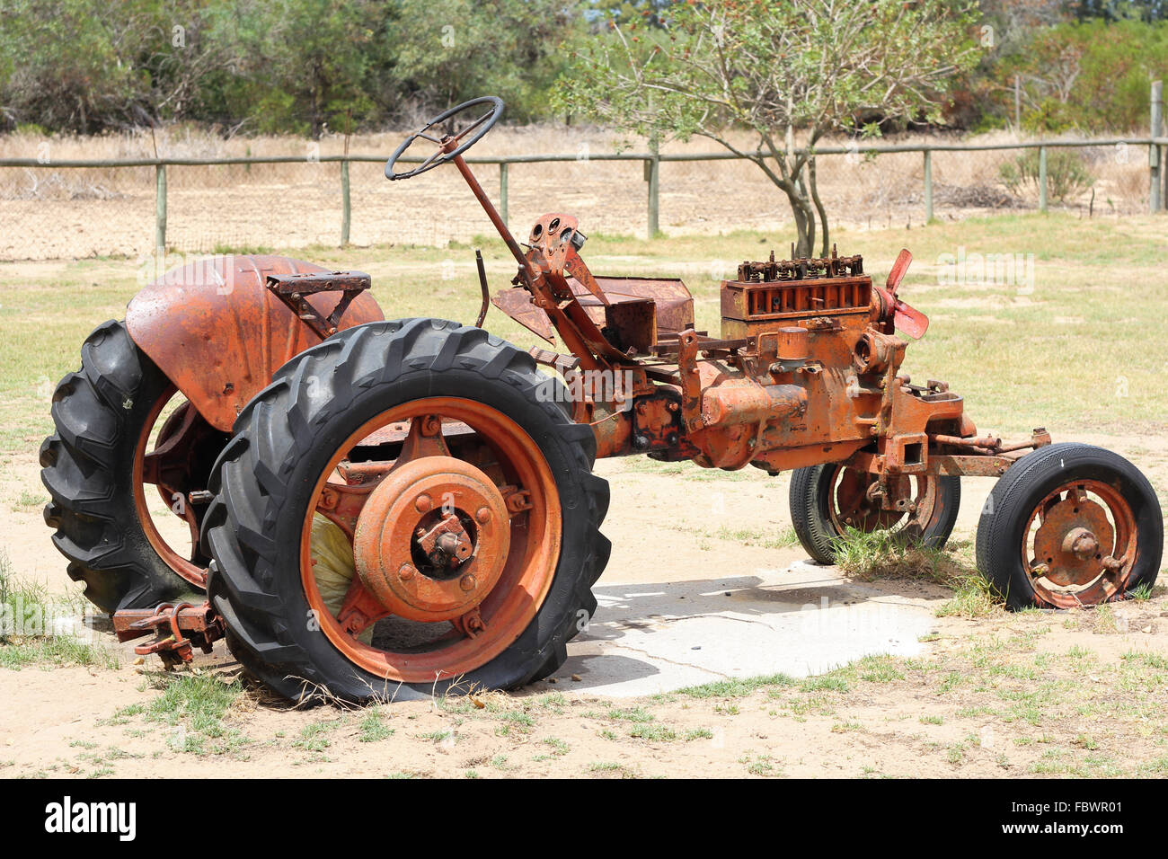 Very old red tractor Stock Photo - Alamy