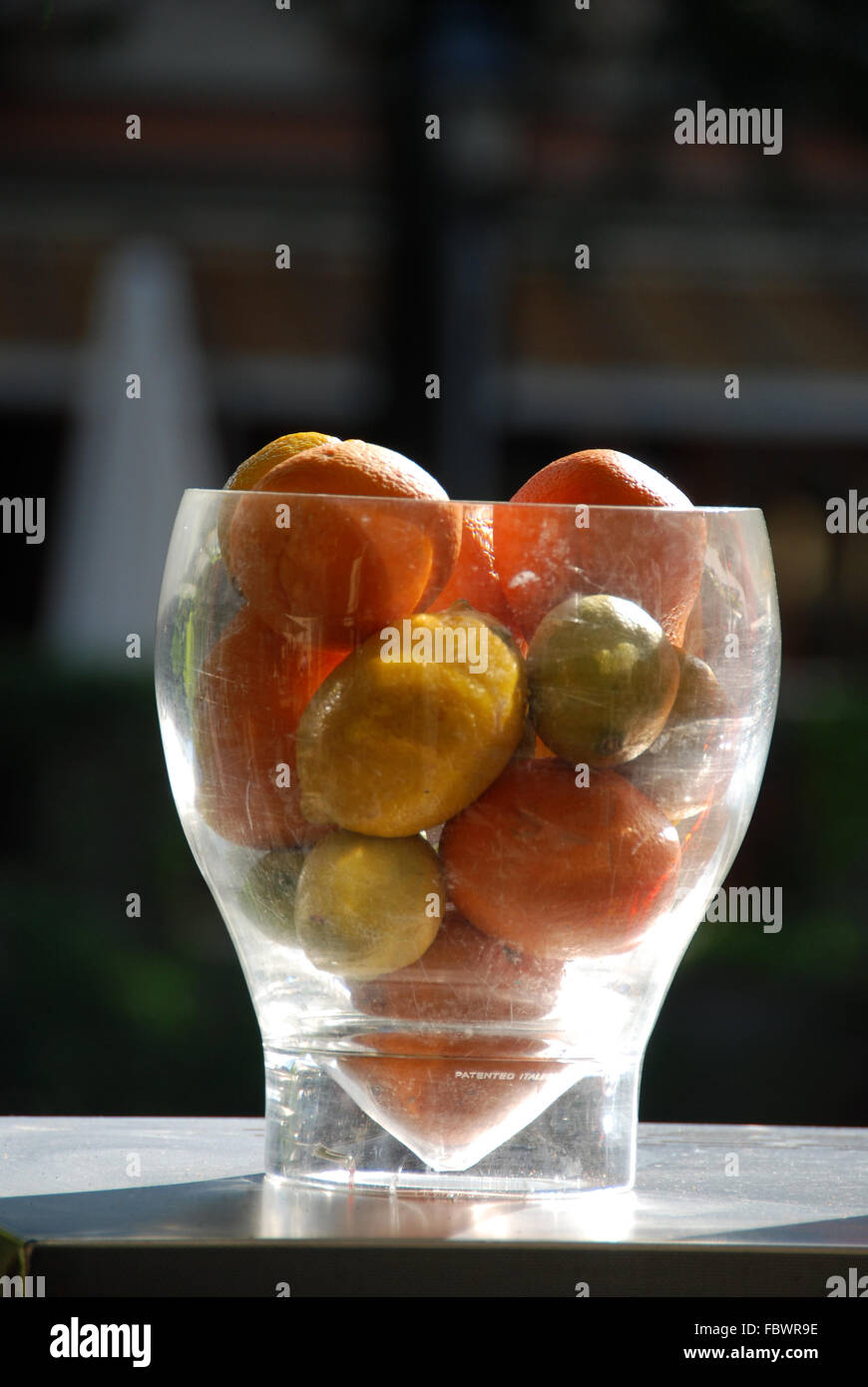 Citrus glass bowl Stock Photo - Alamy