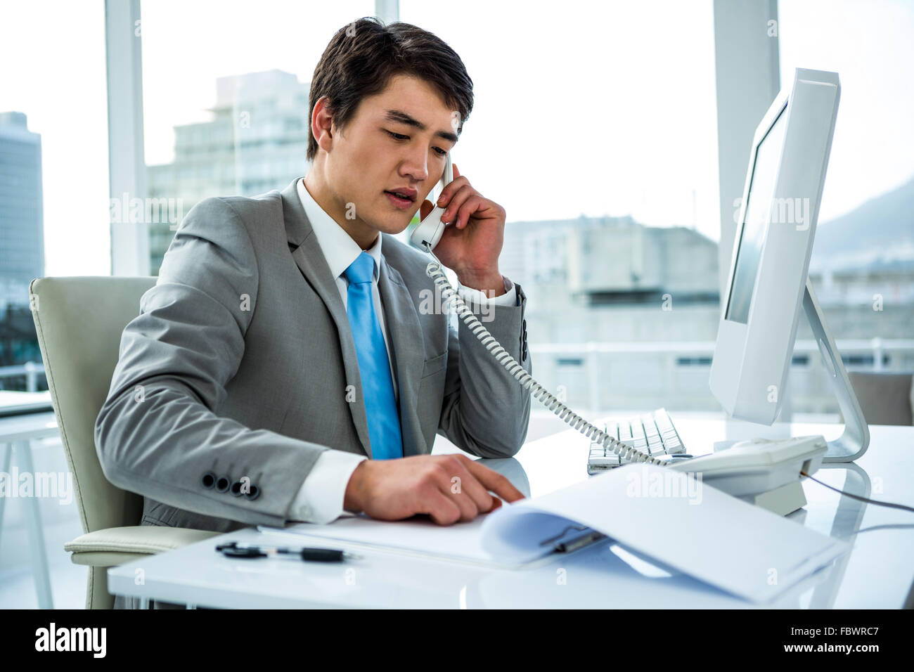 Businessman making a phone call Stock Photo - Alamy