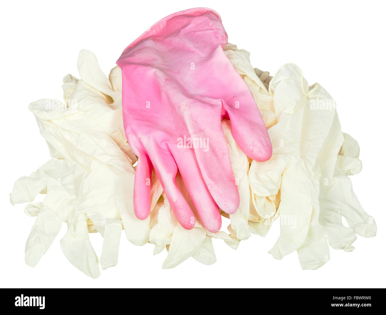 one used pink protective glove on pile of new medical gloves isolated ...
