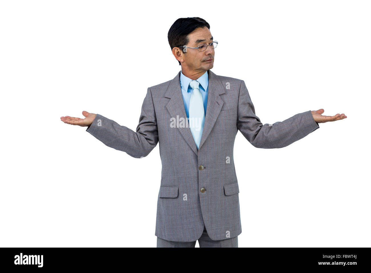 Businessman doing hand gesture Stock Photo - Alamy