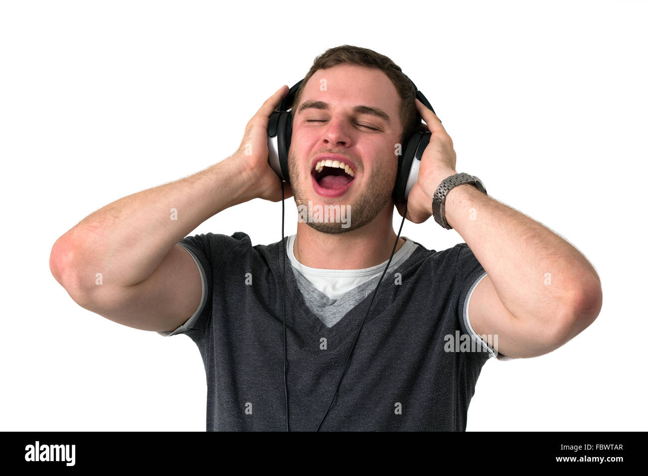 Young man headphones on hi-res stock photography and images - Alamy