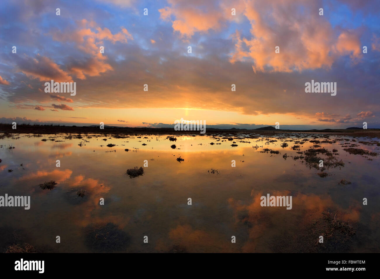 Stunning waterscape sunset in Lemnos lagoon saltlake or saline (or ...