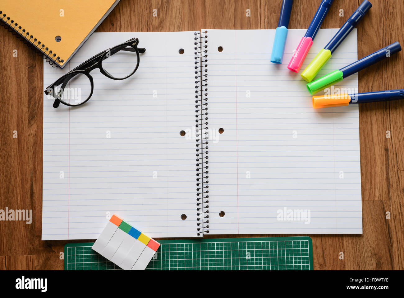 overhead shot of blank notebook equal spacing line on wood floor Stock ...