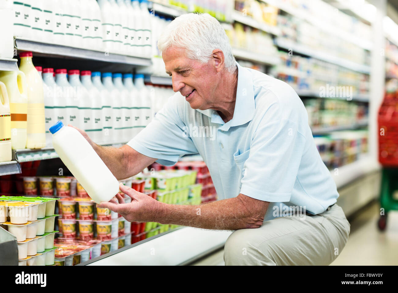 Man milk supermarket aisle hi-res stock photography and images - Alamy