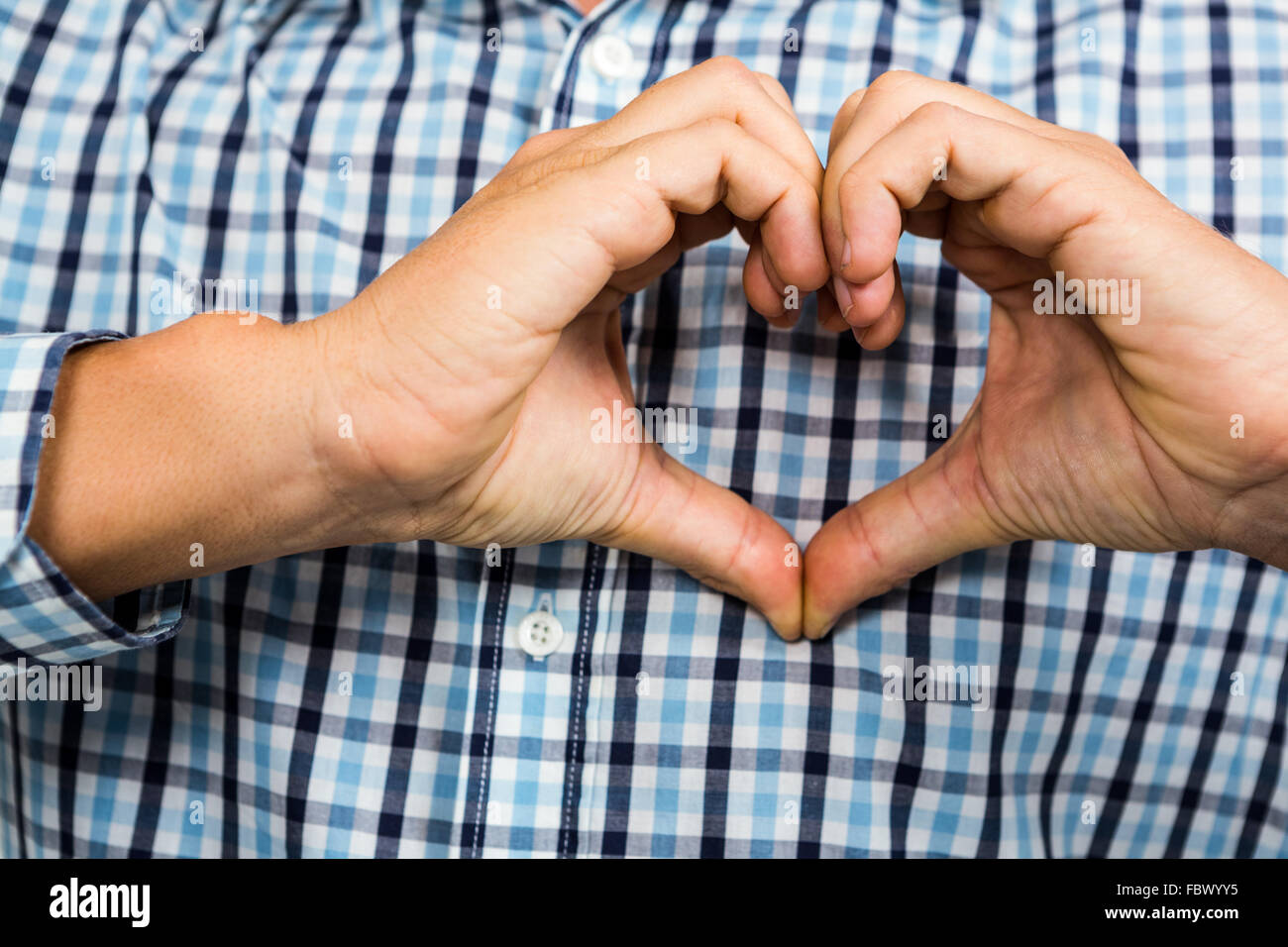 Caucasian man showing heart hi-res stock photography and images - Alamy