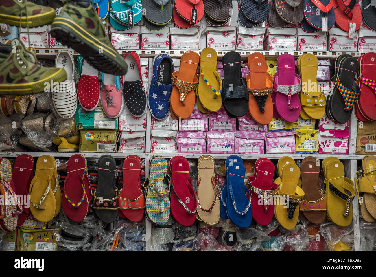 Shoes trainers market stall hi-res stock photography and images - Alamy