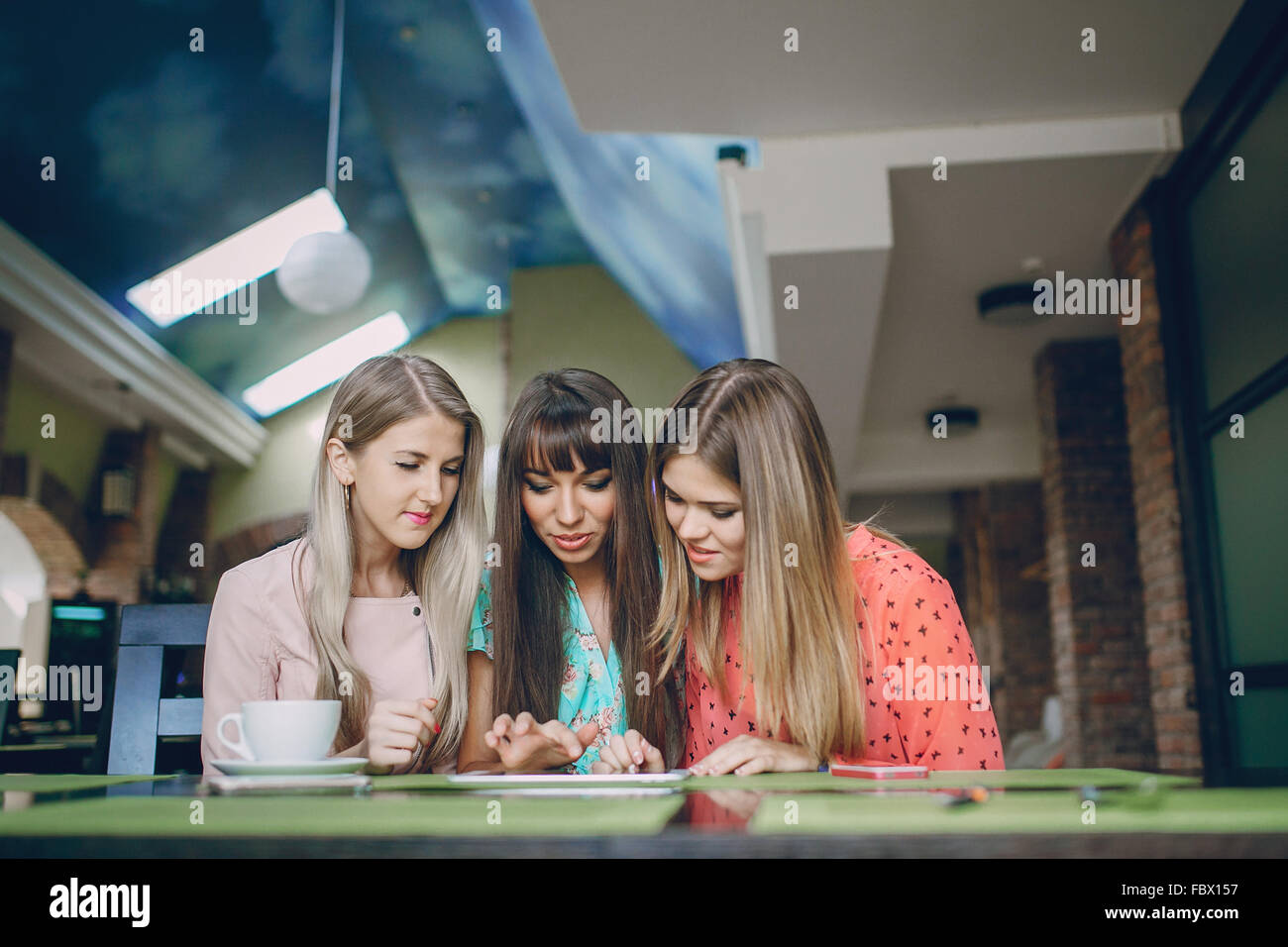 Girls with phones Stock Photo - Alamy