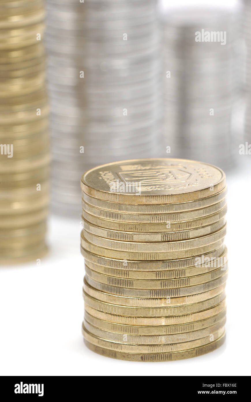 stacks of coins isolated on white Stock Photo - Alamy