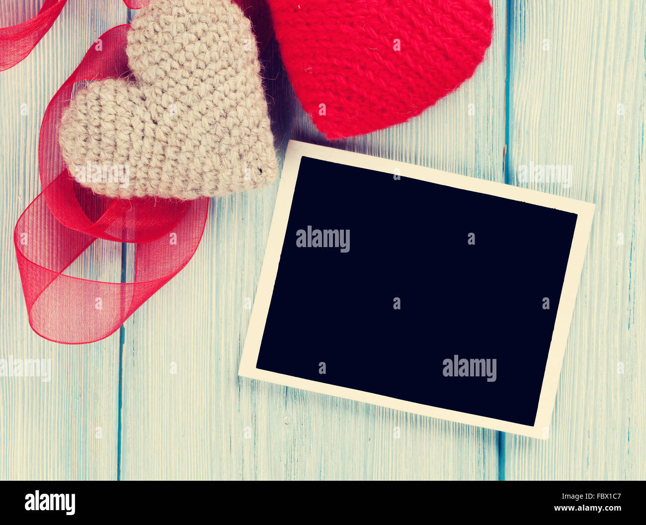 Valentines day greeting card or photo frame and handmaded hearts over ...