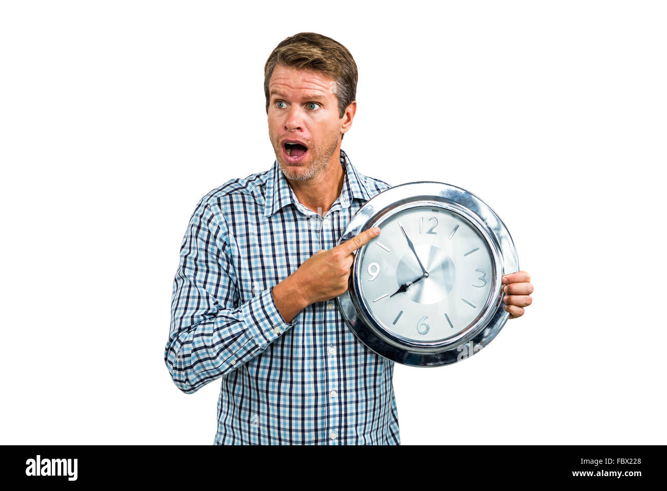 Casual late man showing a clock Stock Photo - Alamy