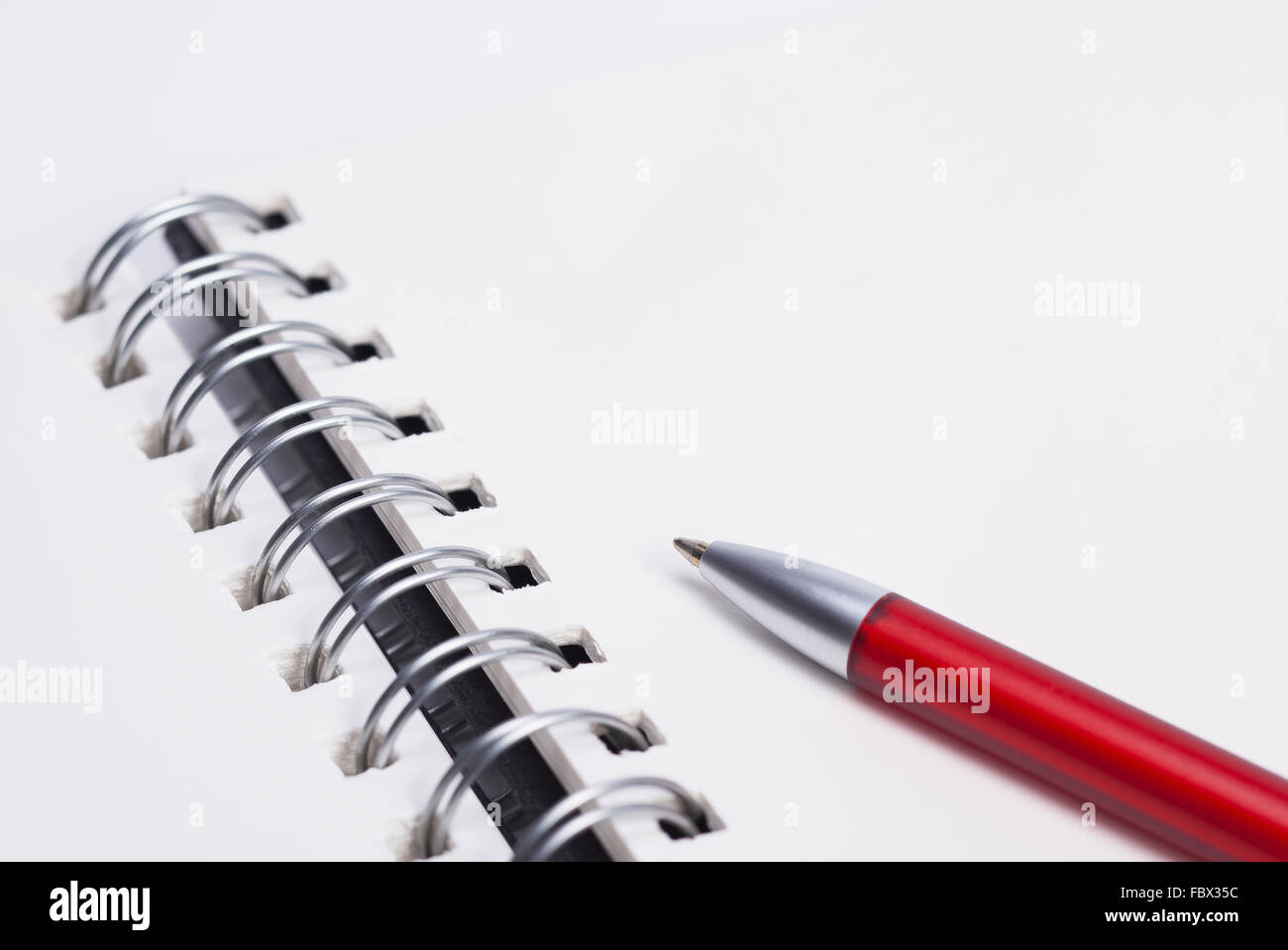 Notebook and pen Stock Photo - Alamy