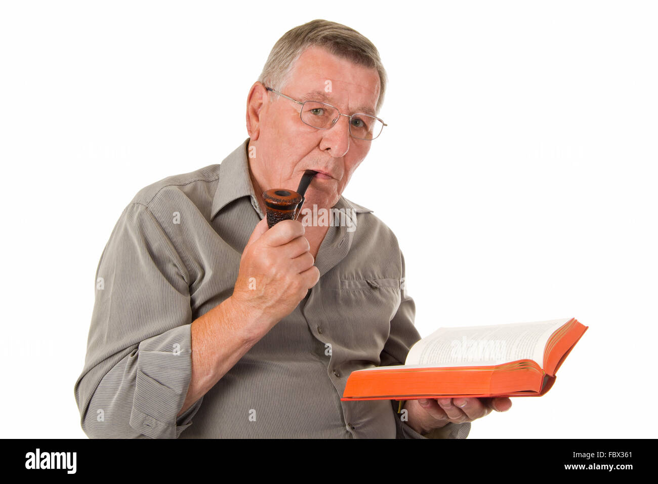 Old man reading a book Stock Photo - Alamy