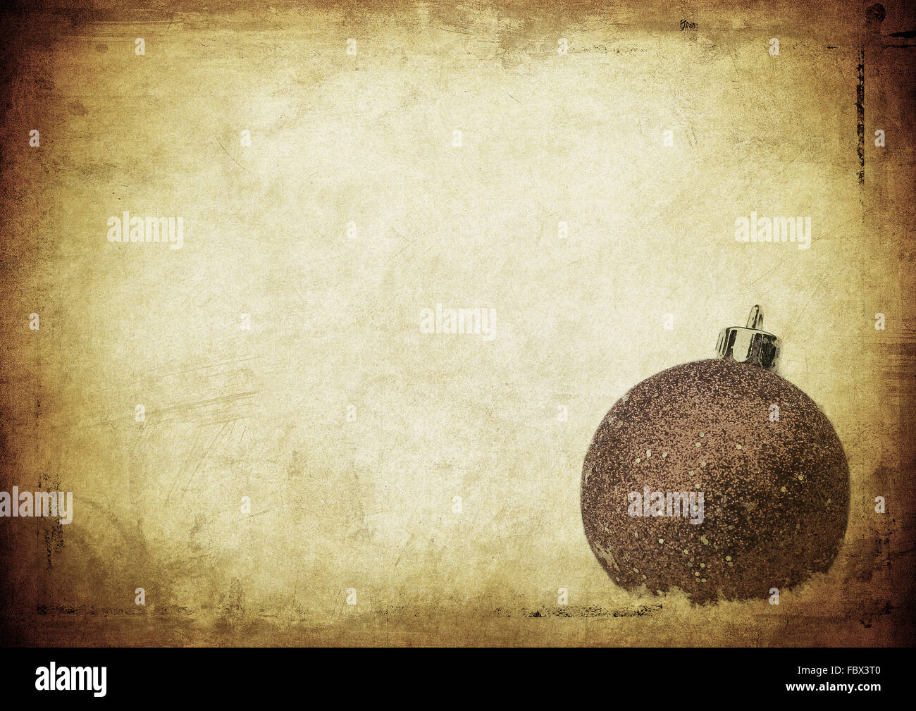 bauble over vintage paper, nice christmas background Stock Photo - Alamy