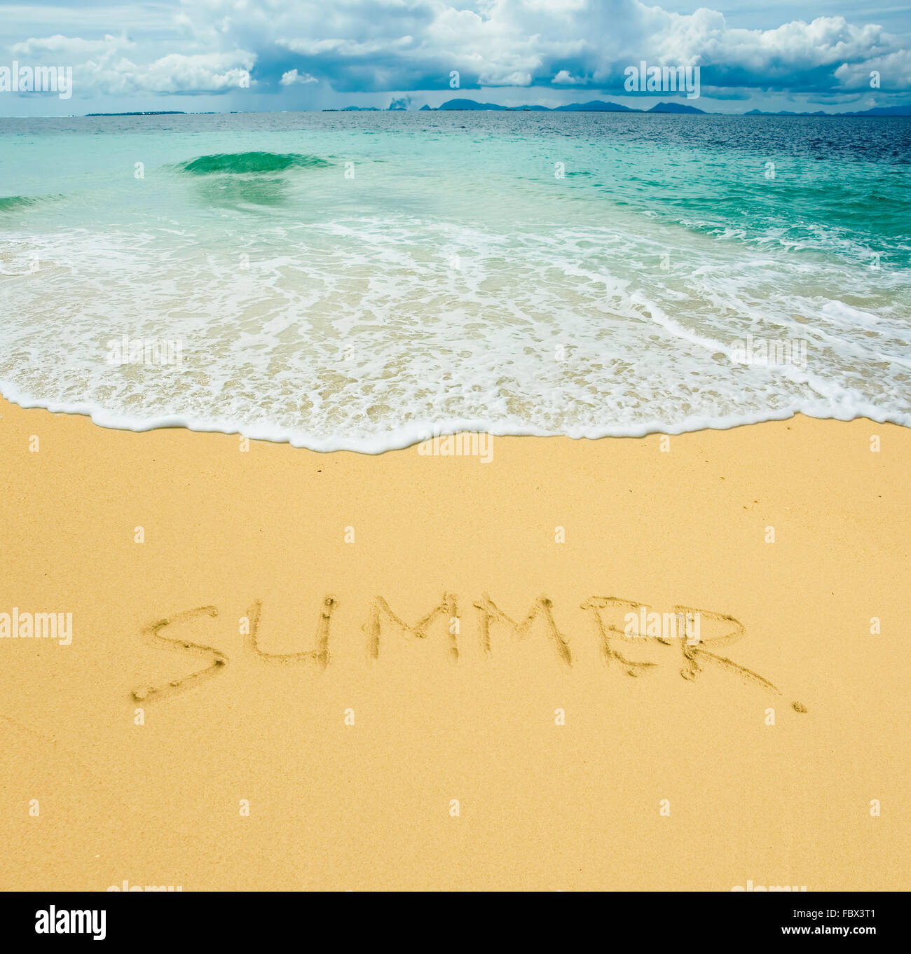 summer written in a sandy tropical beach written in a sandy tropical ...