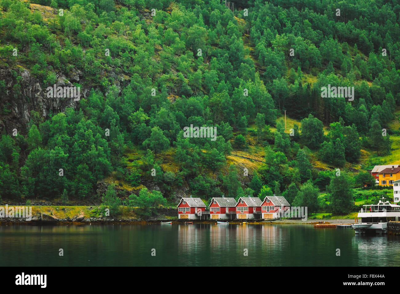 Red wooden docks in small tourist town of Flam on western side of ...