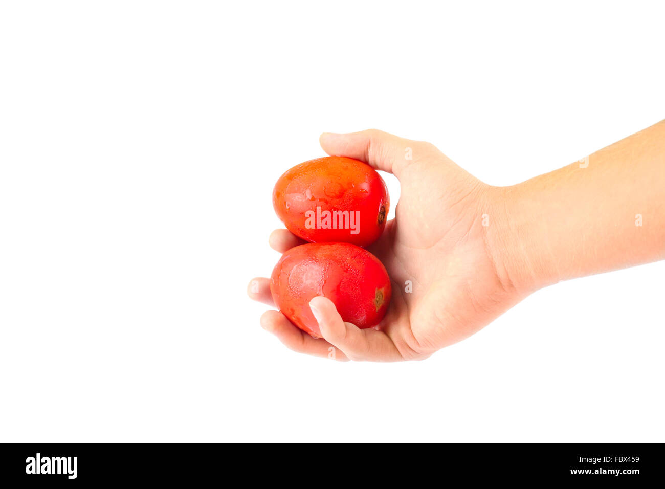 Handful of tomatoes hi-res stock photography and images - Alamy
