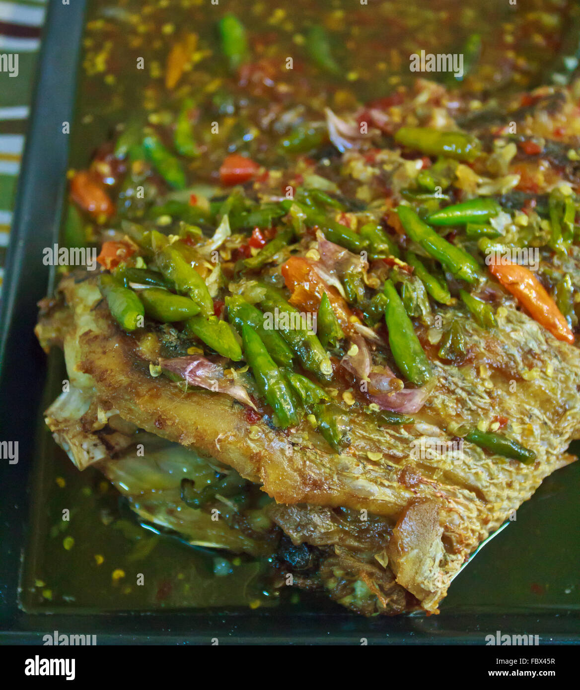 fried fish with garlic and chili 4 Stock Photo - Alamy