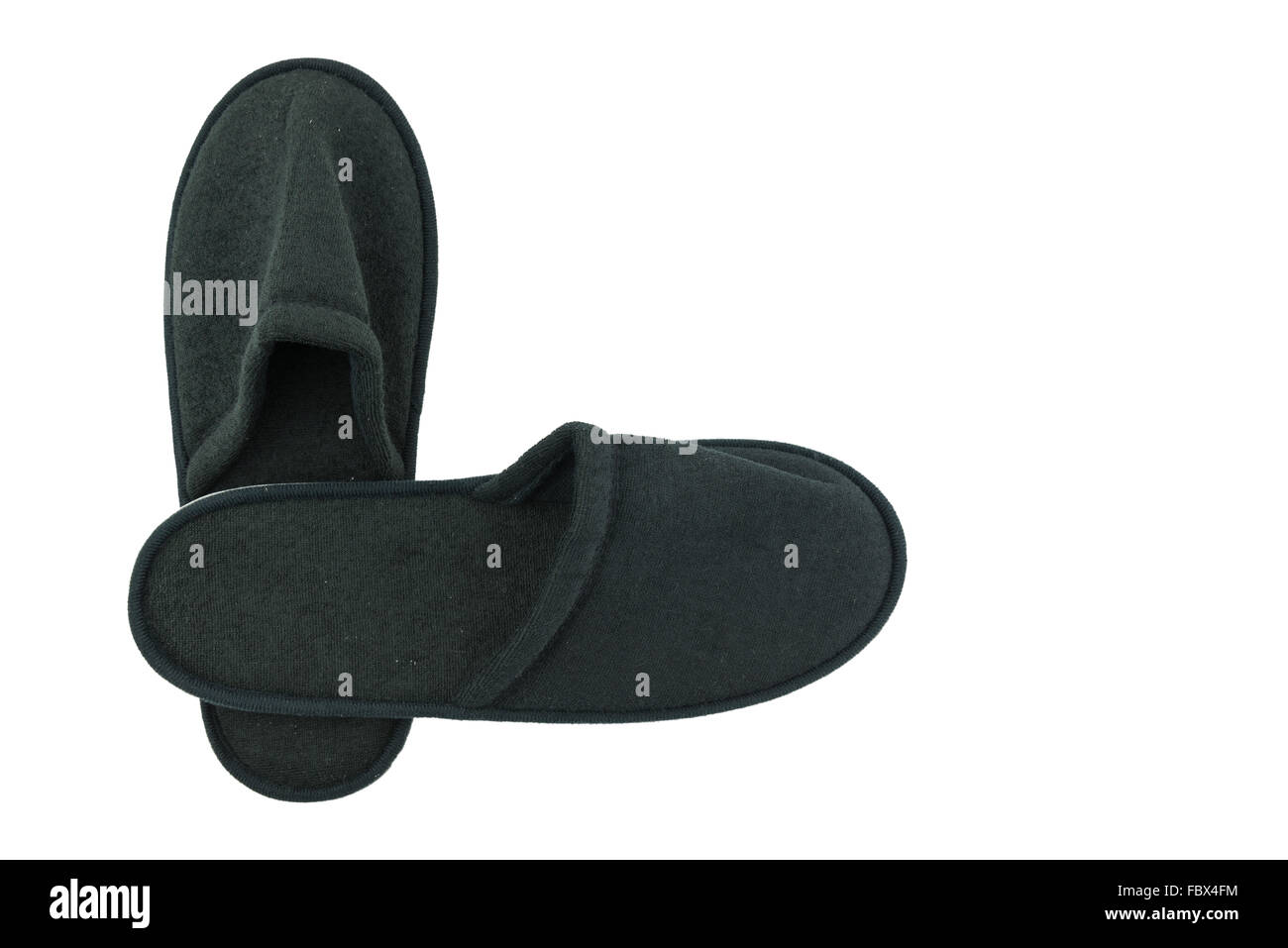 black indoor slippers, isolate white background Stock Photo - Alamy