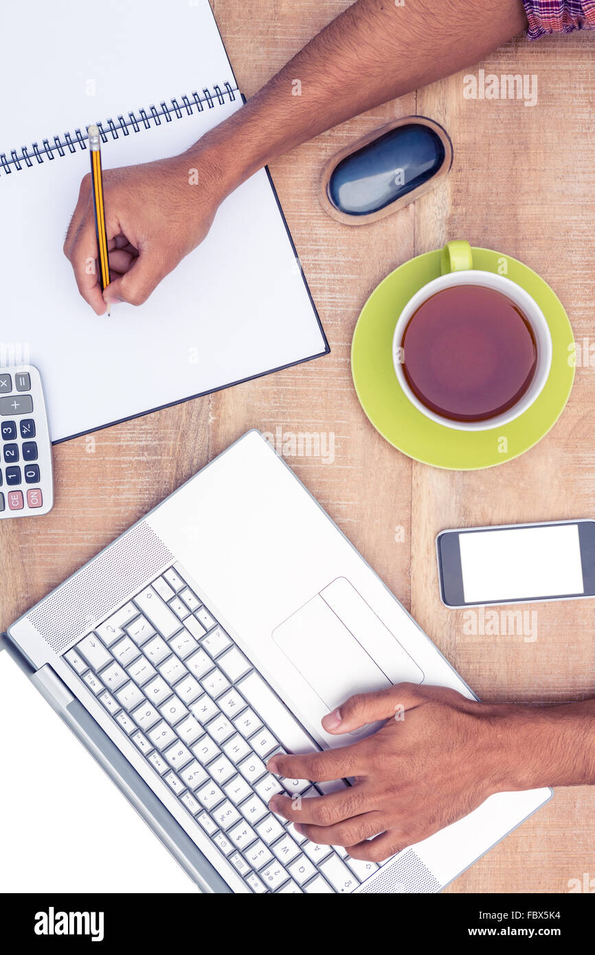 Businessman writing on laptop hi-res stock photography and images - Alamy