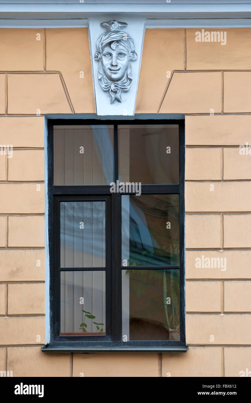 A window with a bas-relief Stock Photo - Alamy