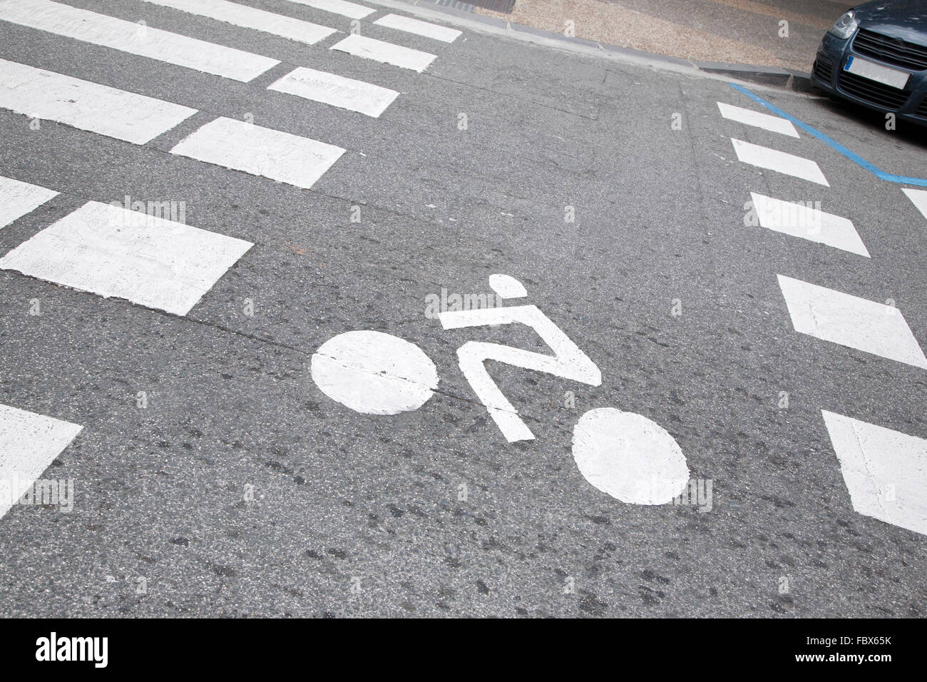Bike Lane Symbol on Stone Pavement Stock Photo - Alamy