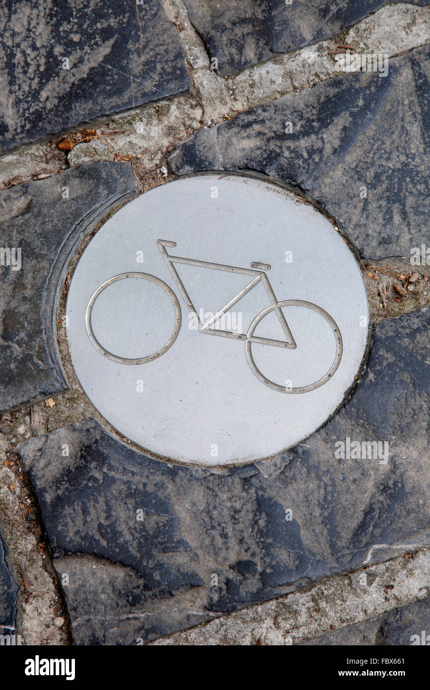 Bike Lane Symbol on Stone Pavement Stock Photo - Alamy