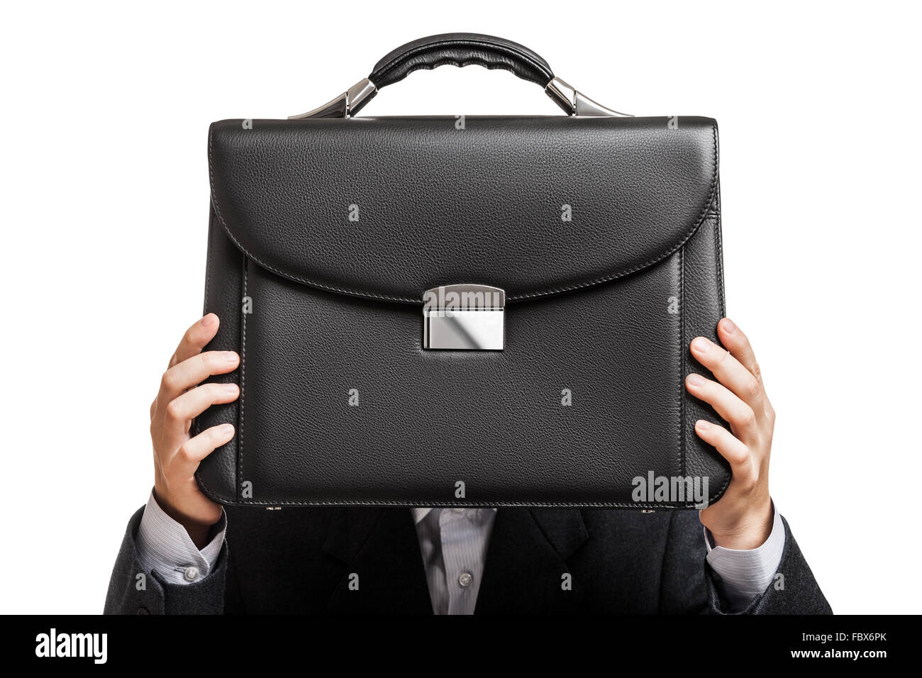 Businessman hand holding briefcase Stock Photo - Alamy