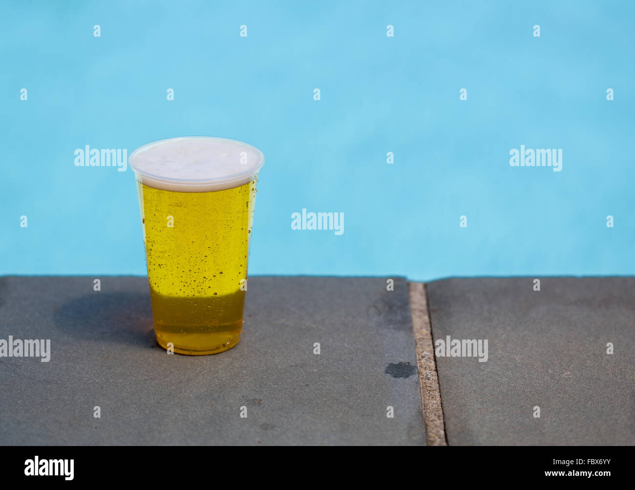 Golden lager beer in disposable hi-res stock photography and images - Alamy