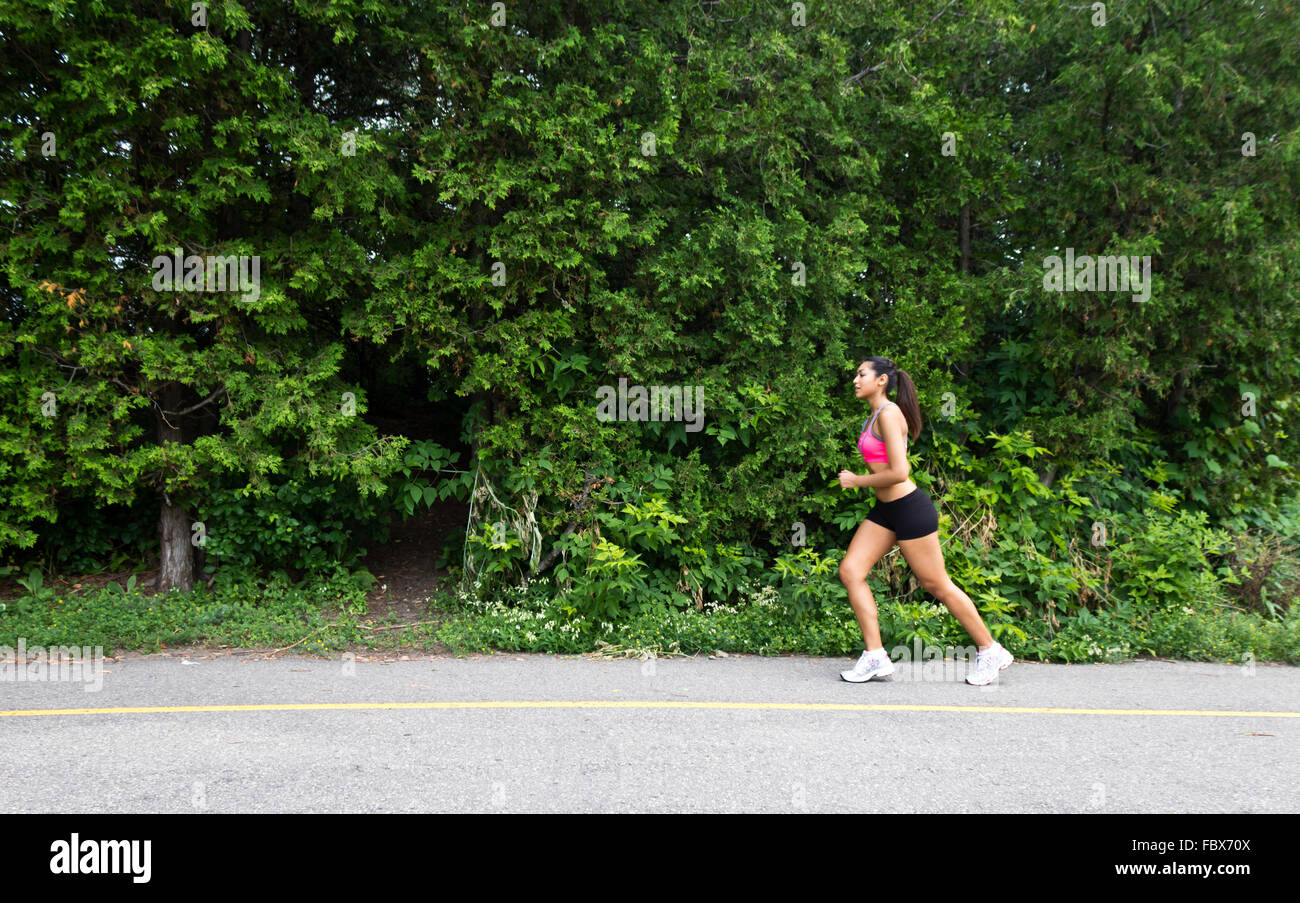 Girl jogging on trail hi-res stock photography and images - Alamy