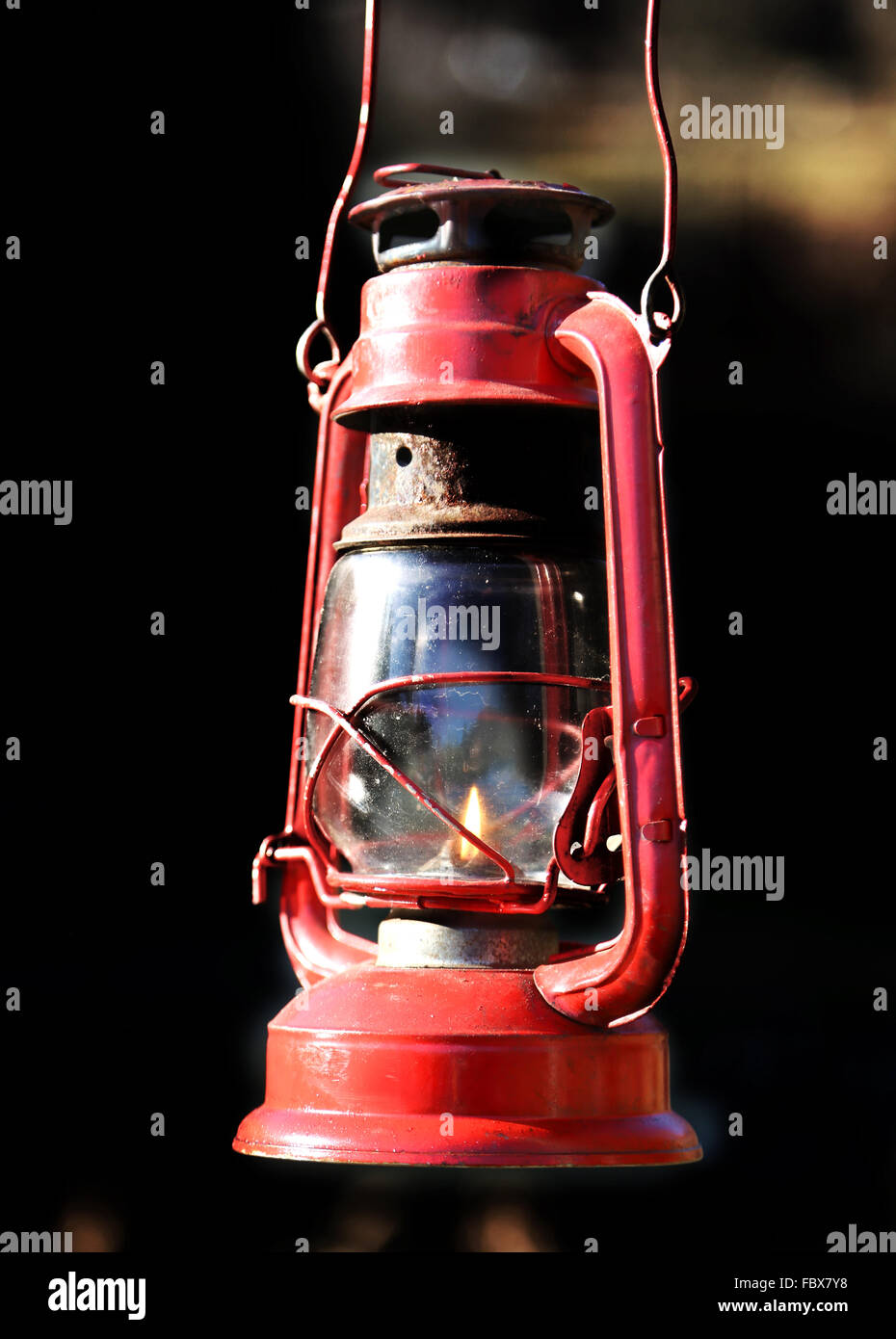 vintage old red lantern with flame Stock Photo - Alamy